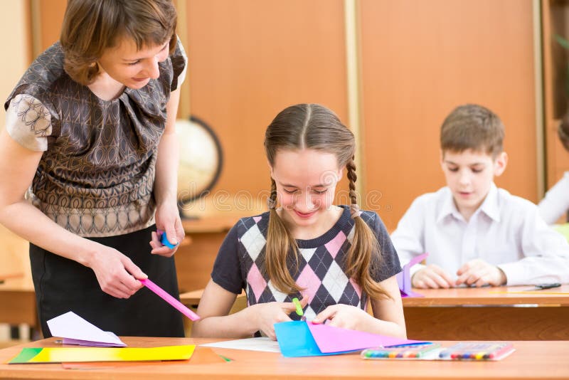 School Kids and Teacher Work at Lesson. Stock Photo - Image of grade ...