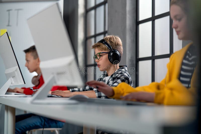 School Kids Using Computer in Classroom at School Stock Photo - Image ...