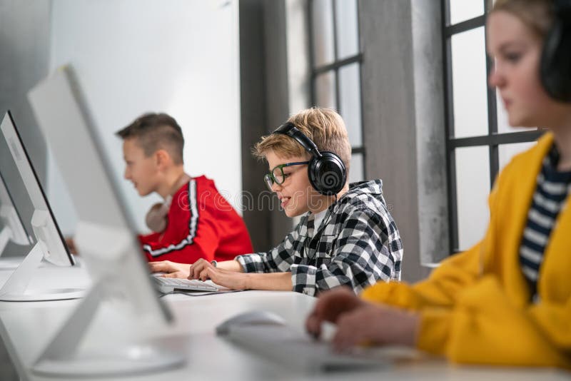 School Kids Using Computer in Classroom at School Stock Image - Image ...