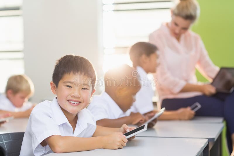 School Kids Using Mobile Phone in Classroom Stock Image - Image of baby ...
