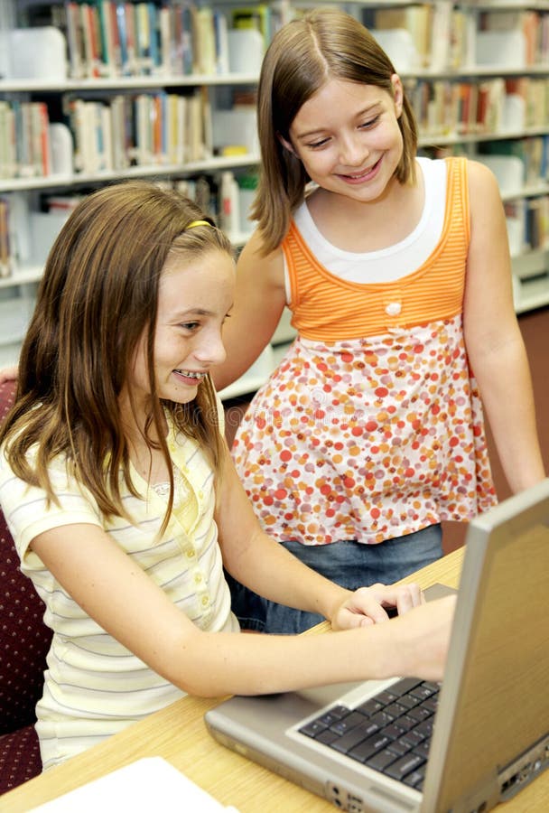 School Library - Two Girls stock image. Image of friend - 2841847
