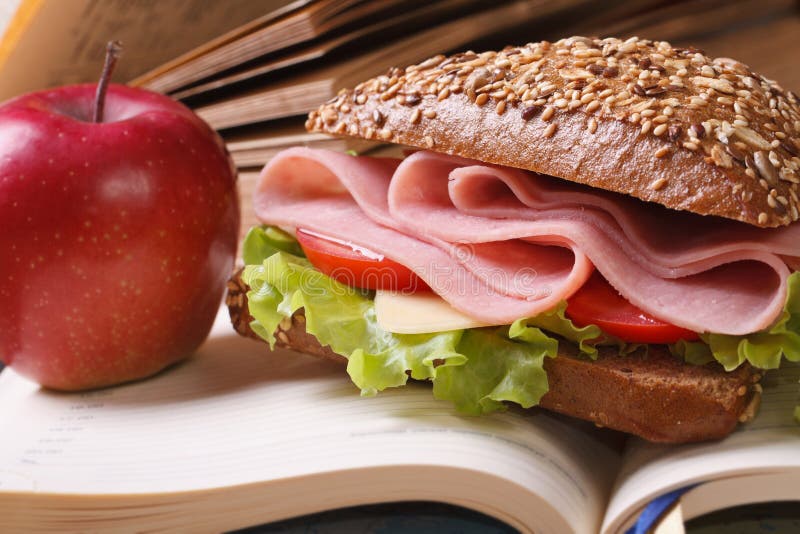 School Lunch: a Ham Sandwich and an Apple on Open Notebook Stock Photo ...