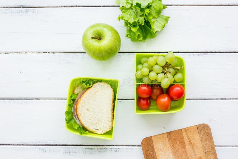 School Lunch Set with Apple and Vegetables in Lunchbox Background Top ...