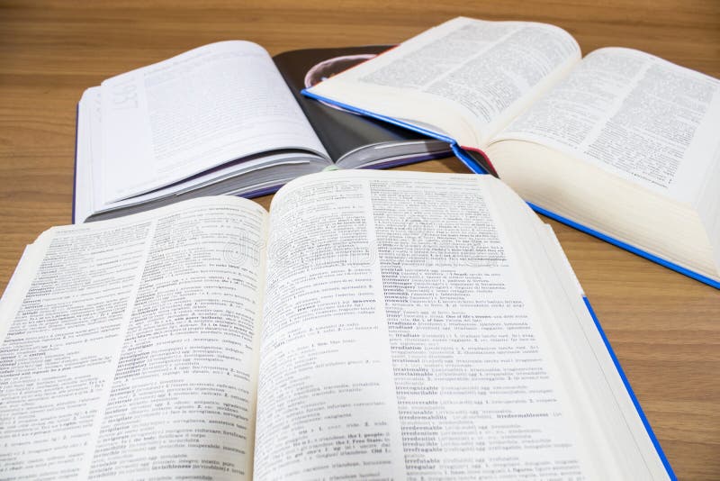 School, Many Open Books on a Wood Table Stock Photo - Image of writing ...