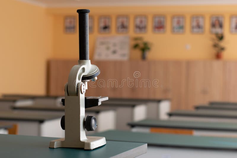School Microscope in Chemistry on the Table in the Laboratory at School ...