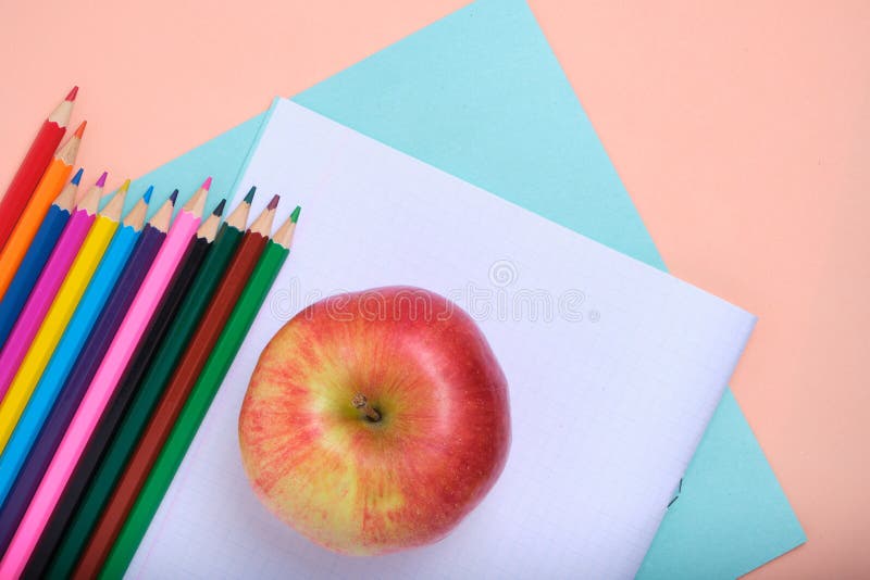 School Notebook, Apple and Pencils Pink Background Stock Photo - Image ...