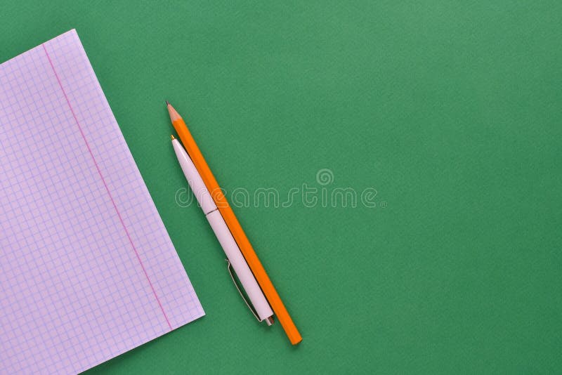 School Notebook in the Box, Pen, Pencil on a Green Background. Empty ...