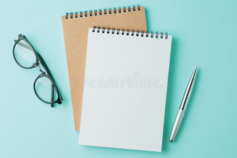 School Notebook on Cyan Color Background Top View Stock Photo - Image ...