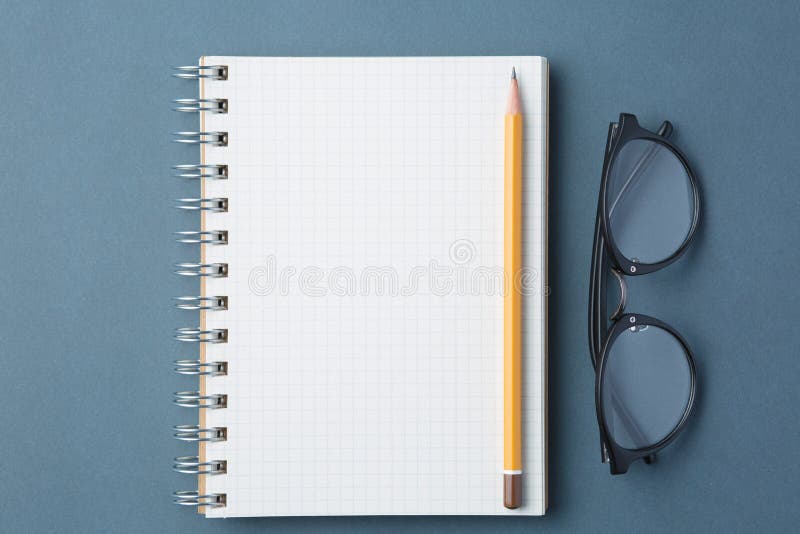 School Notebook on Dark Blue Background Stock Photo - Image of pencil ...