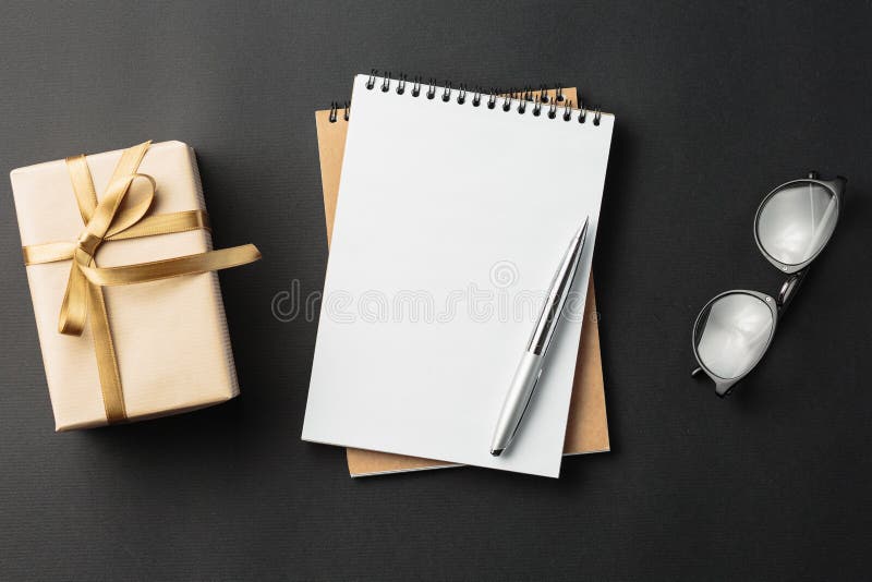 School Notebook with Gifts on Black Background, Gift Boxes with Stock ...