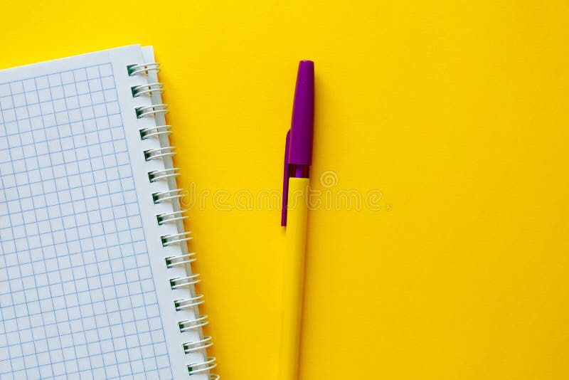 School Notebook with Pencil on Yellow Background. Blank Notebook Page ...