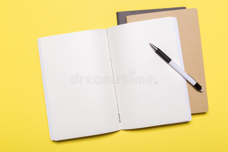 School Notebook on a Yellow Background Stock Photo - Image of notebook ...