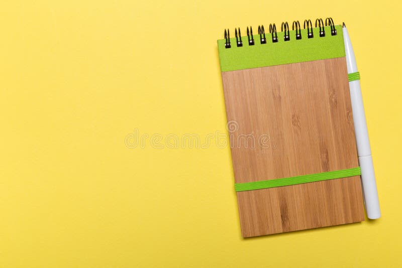 School Notebook on a Yellow Background Stock Photo - Image of paper ...