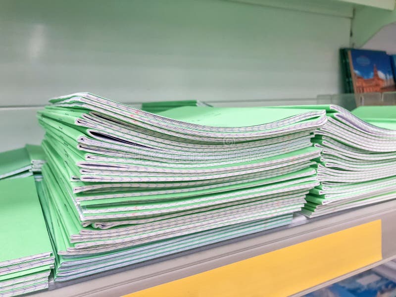 School and Office Supplies. View Notebooks of Bright Color on Shelf for ...