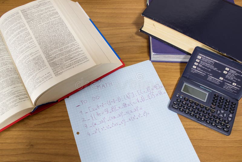 School, an Open Book, a Pile of Books and Math Homework with a C Stock ...