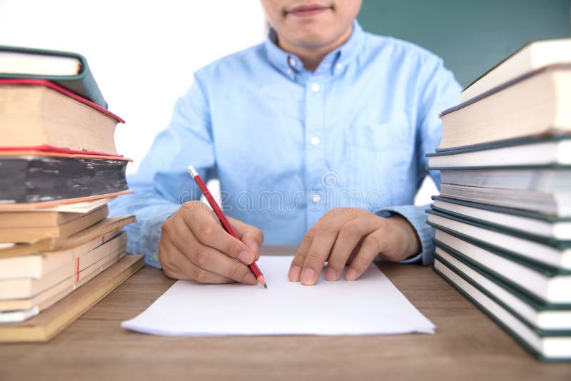 The School`s Male Teacher is Preparing Lessons Stock Photo - Image of ...