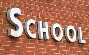 School Sign stock image. Image of building, kids, word - 1498071