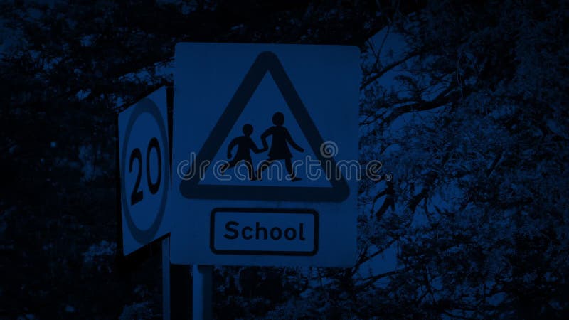 School Sign Outside at Night Stock Footage - Video of traffic, street ...