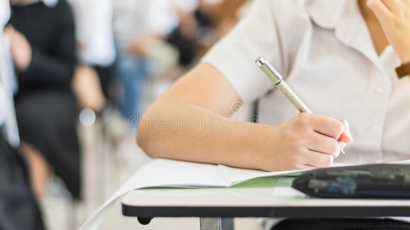 School Student`s Taking Exam, Thinking Hard, Writing Answer in ...