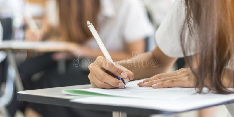 School Student`s Taking Exam, Thinking Hard, Writing Answer in ...