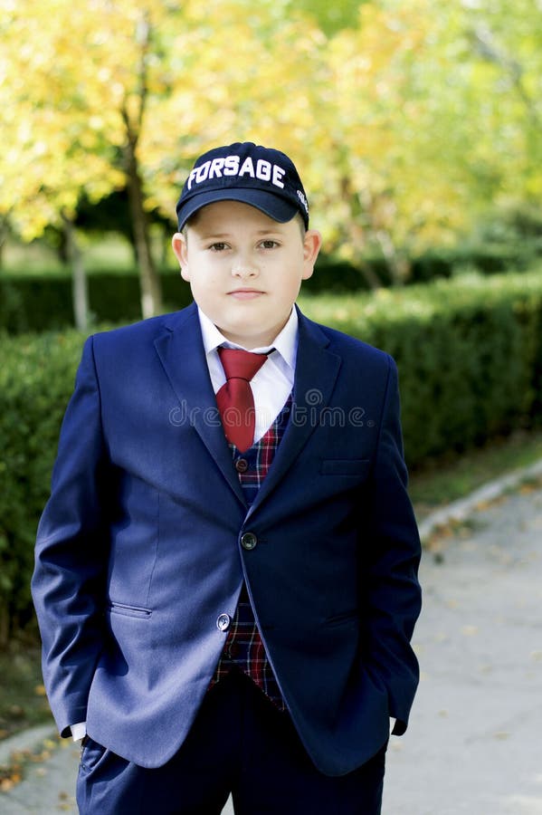 The School Student in a Suit in the Fall Near School, Fall, a Su Stock ...