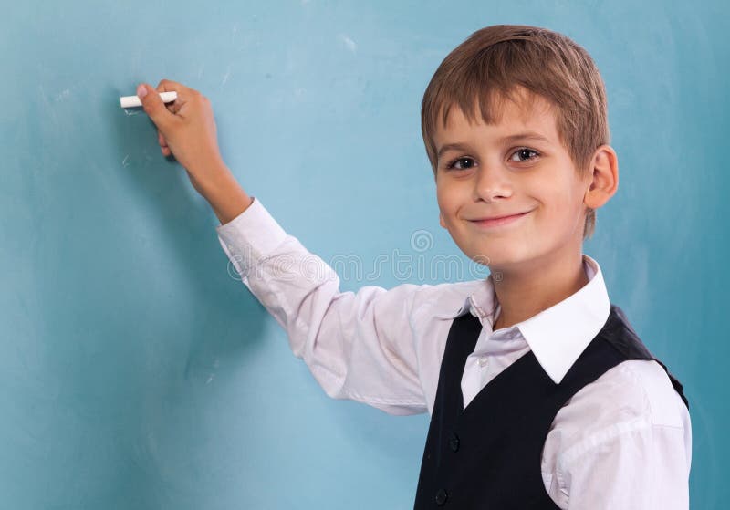 School Student Writing on Blackboard at School Stock Photo - Image of ...