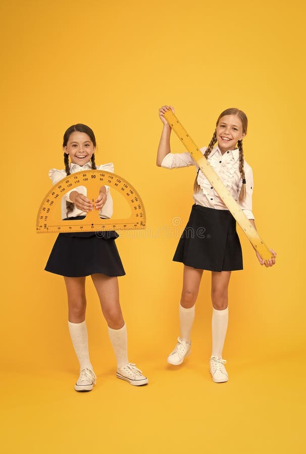 School Students Learning Geometry. Kids School Uniform on Orange ...