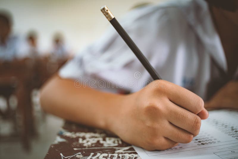 School Students Taking Exam Answer in Classroom with Stress Stock Image ...