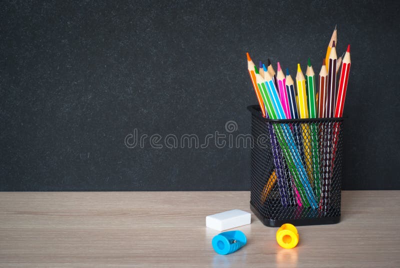 School Supplies on Classroom Table Stock Photo - Image of chalkboard ...