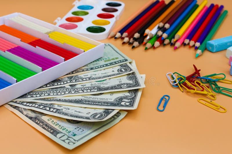 School Supplies and Dollars. Stock Photo - Image of objects, dollars ...