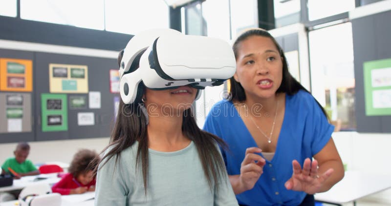 In School, Teacher Guiding Student Using VR Headset in Classroom ...