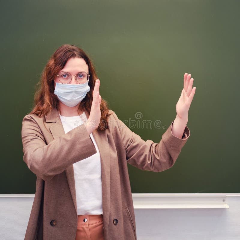 School Teacher Showing Distance Gesture, School Blackboard Copy Space ...