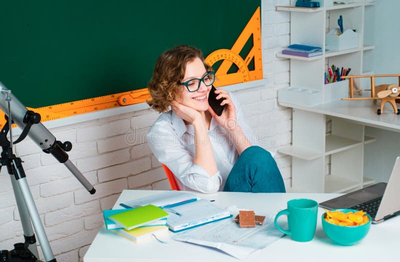 School Teacher Talking on Smartphone. Study and Learning. Education ...