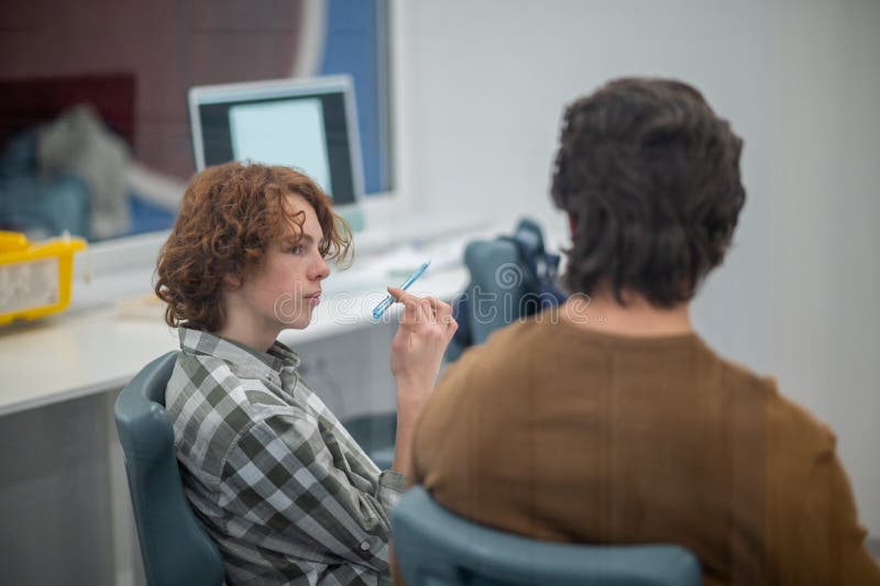 A School Teacher Talking To His Student Stock Photo - Image of ...