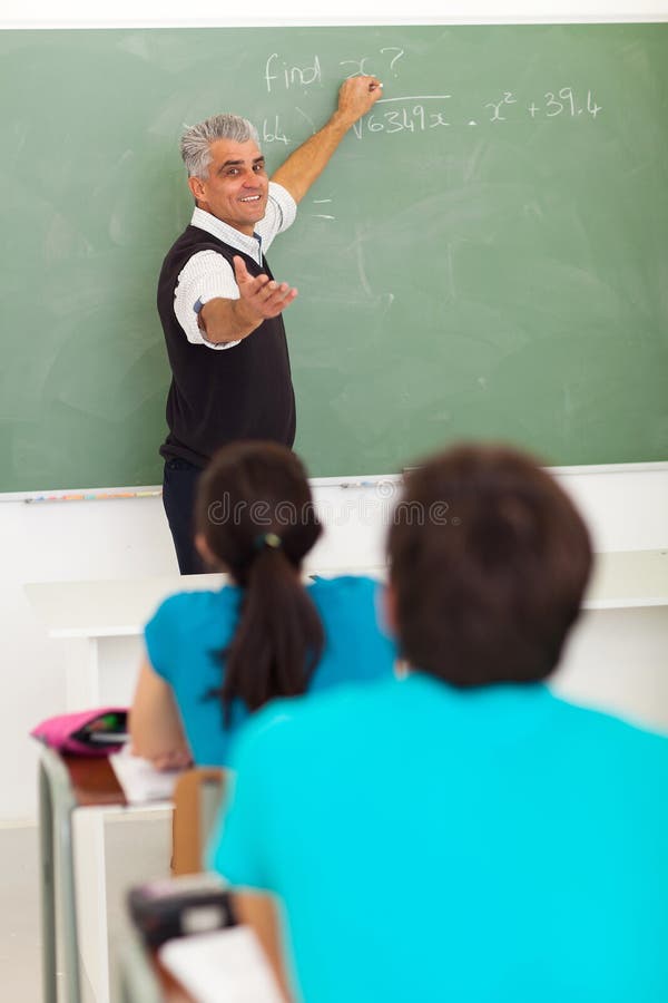 School teacher teaching stock image. Image of classroom - 31574563