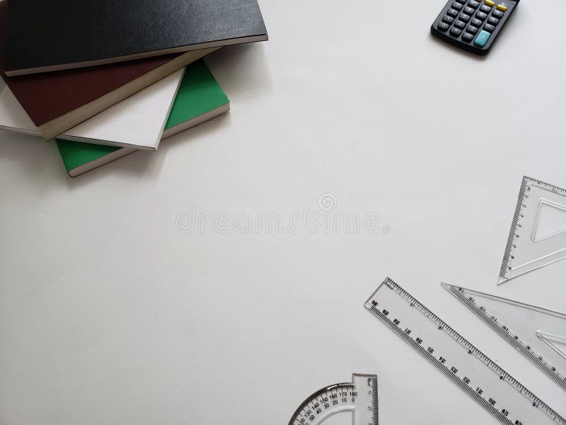 Stacked Books, Set of Geometry Objects and Calculator Stock Image ...