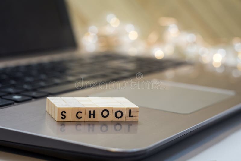 SCHOOL Virtual Learning Concept with Wood Block Letters on Laptop Stock ...