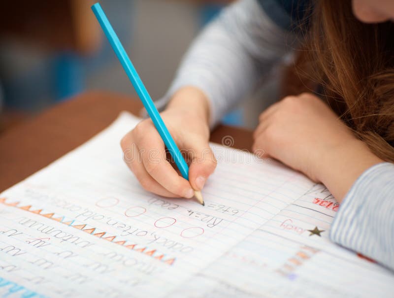 School, Writing and Hand of Girl in Classroom with Test for Growth ...