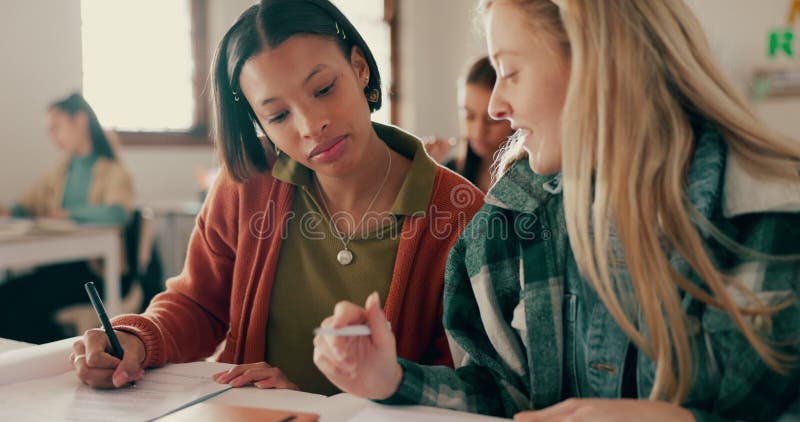 Four Students Working Together on a Project in a Classroom Setting ...