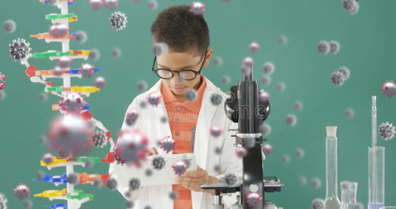 In School, Young Boy in Lab Coat Studying with Tablet and Microscope ...