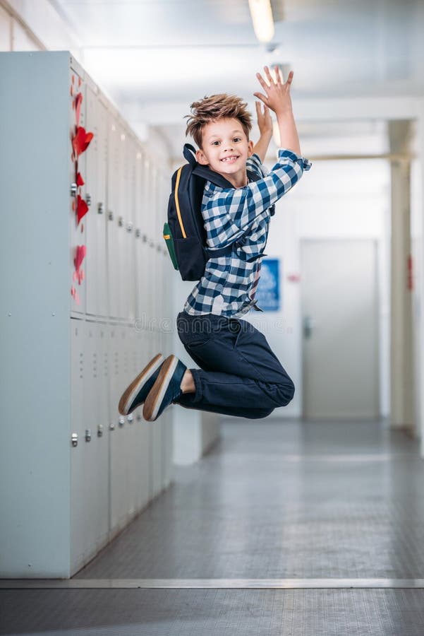 Adorable Little Boy Jumping Stock Image - Image of discovery, student ...