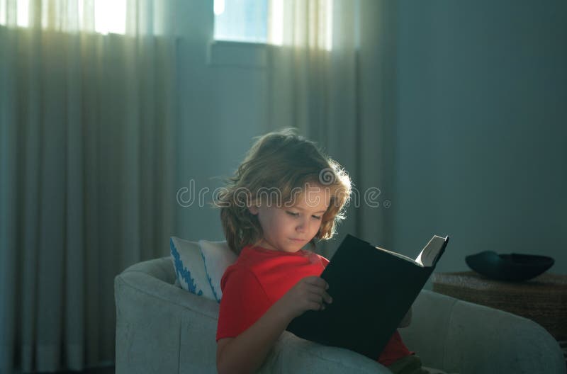 Schoolboy with Book. Kid Read Book at Home. Stock Photo - Image of ...