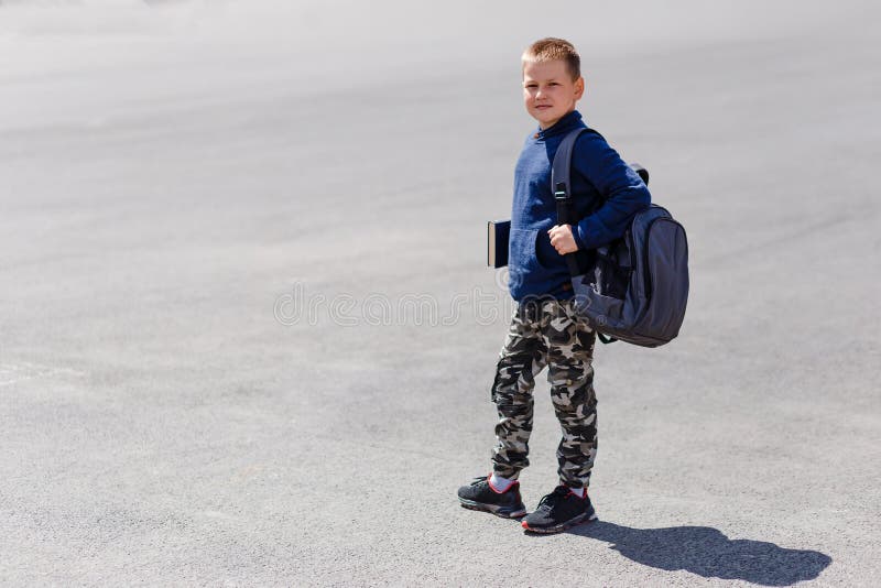 Schoolboy Boy with Large Backpack on His Back Stock Photo - Image of ...