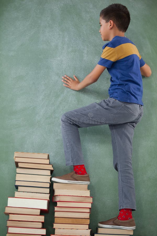 Schoolboy Climbing Steps of Books Stack Stock Photo - Image of ...