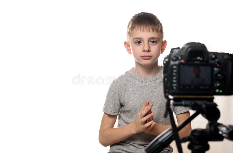Schoolboy in Concentration is Preparing for an Interview in Front of a ...