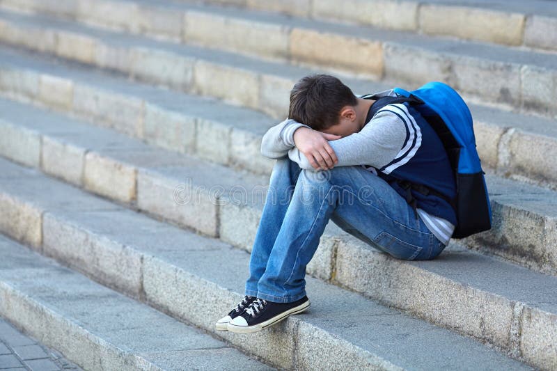 Schoolboy Crying in the Yard of the School Stock Photo - Image of ...
