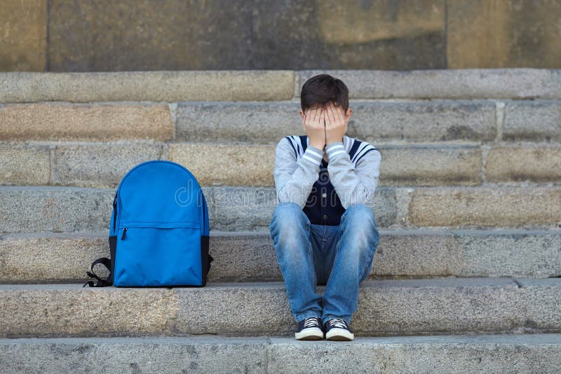 Schoolboy Crying in the Yard of the School Stock Image - Image of ...