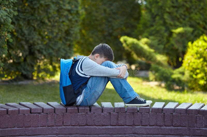 Schoolboy Crying in the Yard of the School Stock Photo - Image of ...