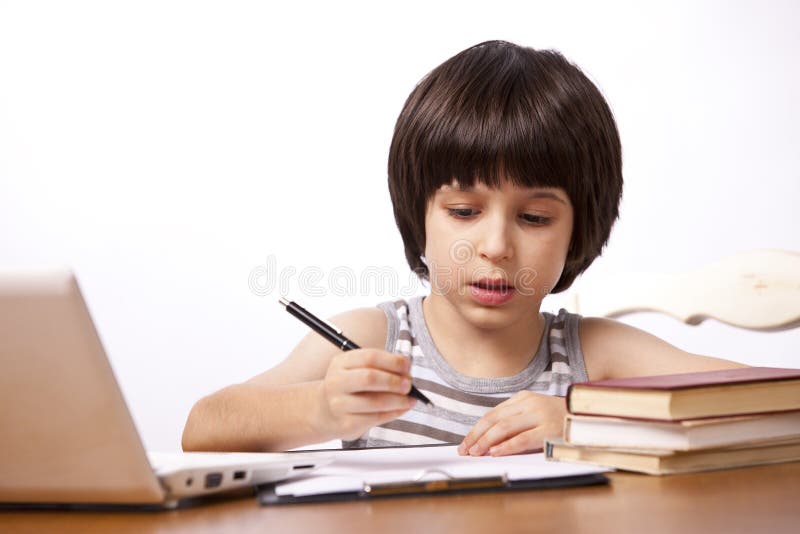 Schoolboy Does His Homework Stock Photo - Image of looking, children ...