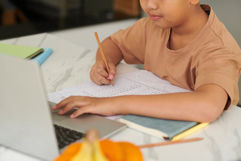 Schoolboy Doing Math Homework Stock Image - Image of class, freelancer ...
